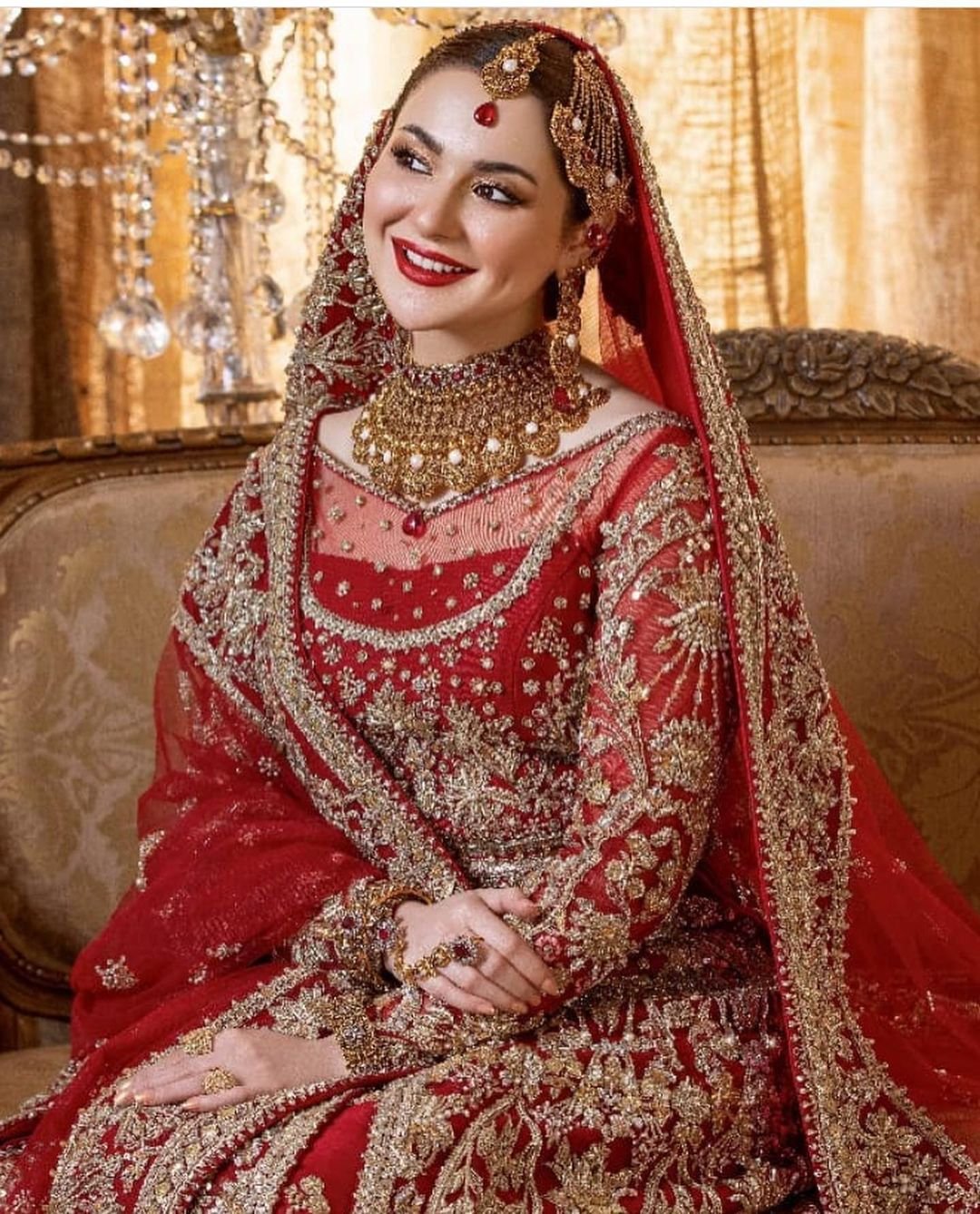 Hania Aamir Flaunts Elegance in Traditional Red Bridal attire ...